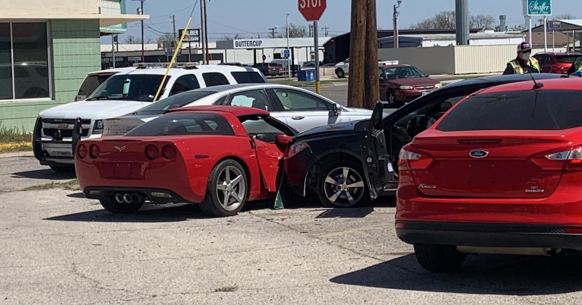 WATCH: Red Corvette on Used Car Lot Mangled in Crash