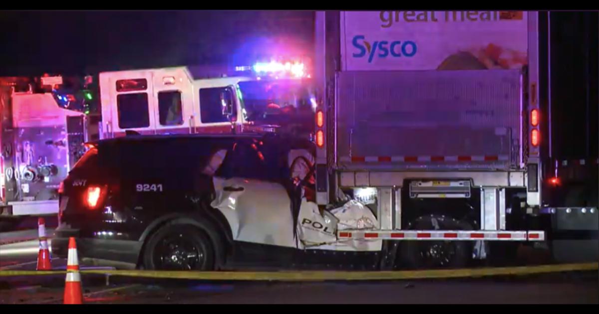 Police Officer Hospitalized After Smashing Into Semi