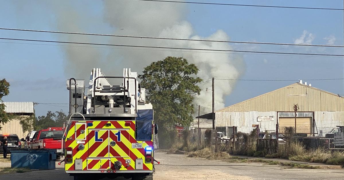 Structure Fire on Industry Street: Smoke Fills Sky as Firefighters Respond