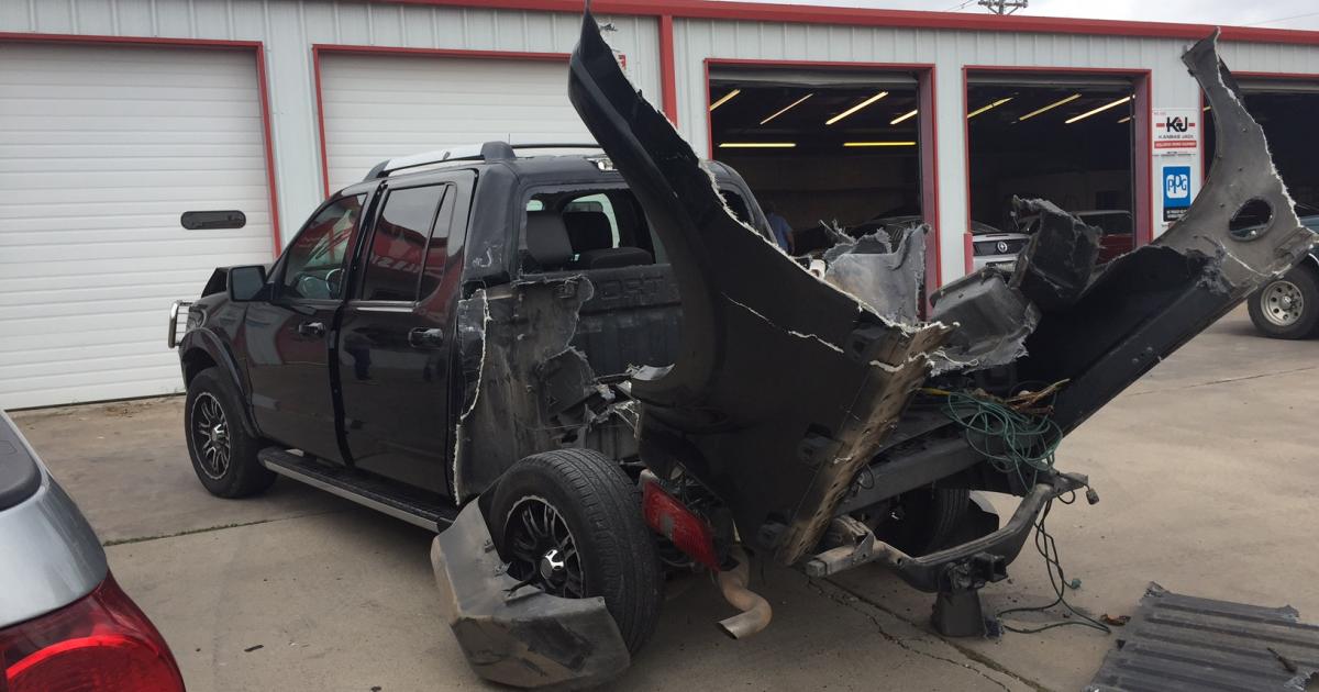 3 Trucks Smashed in Front of Body Shop