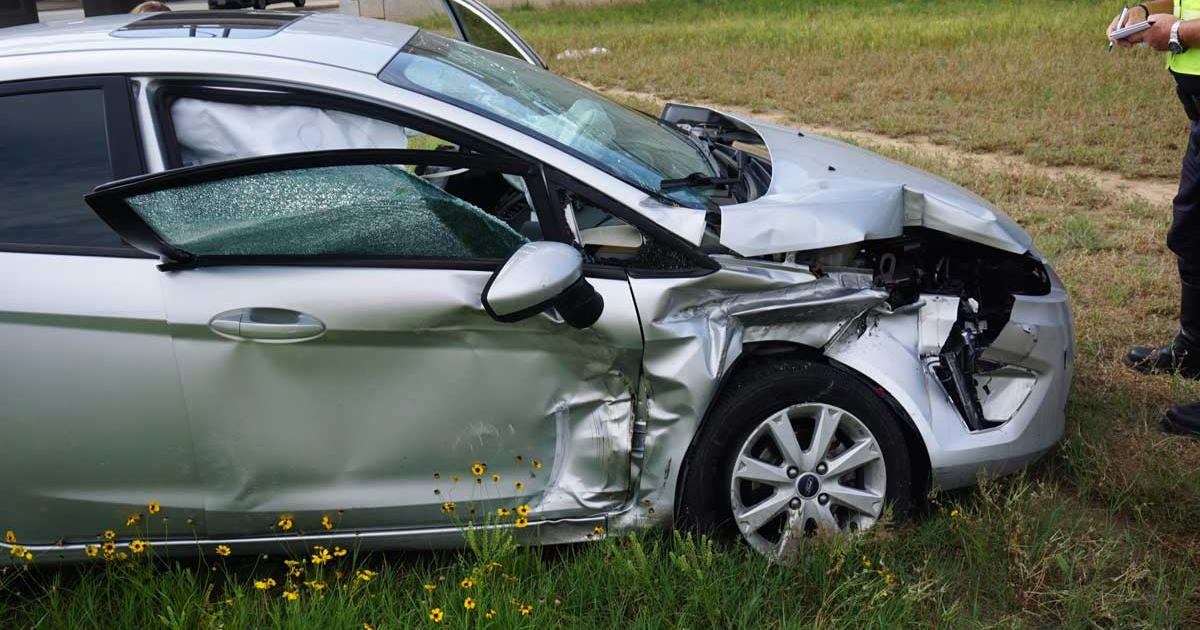 Ford Fusion Crumpled in Crash with Ram 2500 on Oakes