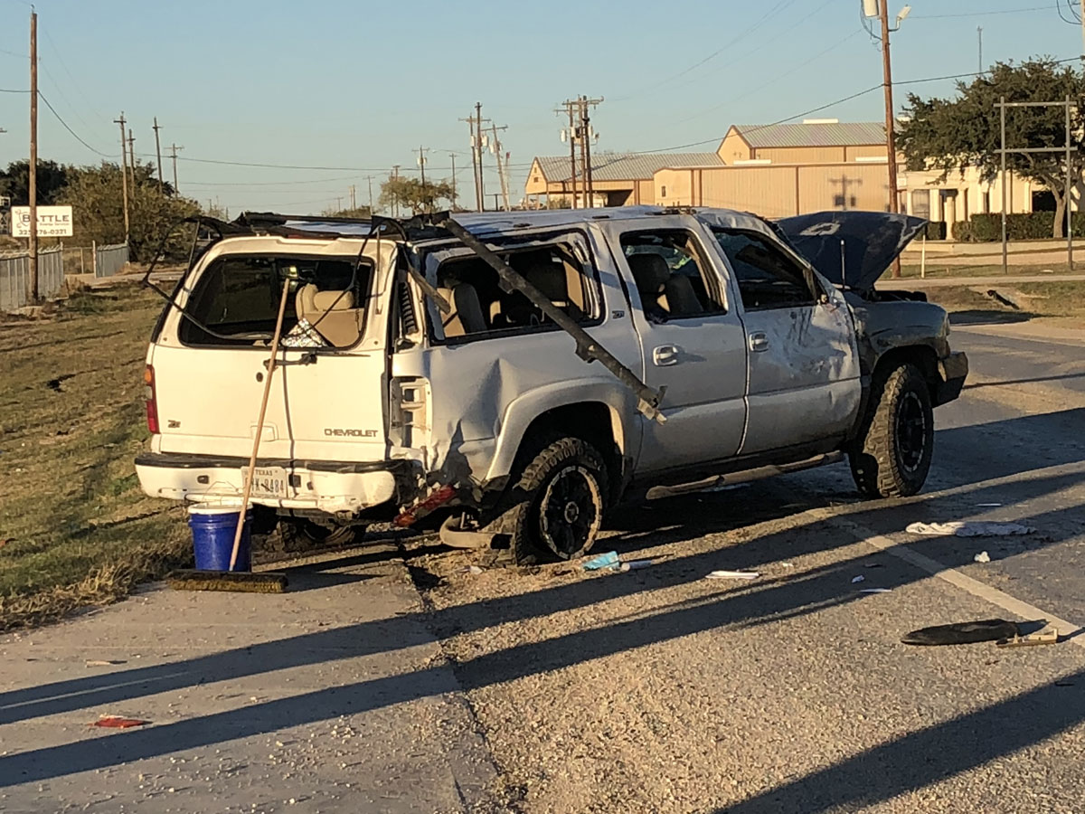Suburban Rolls 2 or 3 Times in Crash that Closes Old Christoval Road